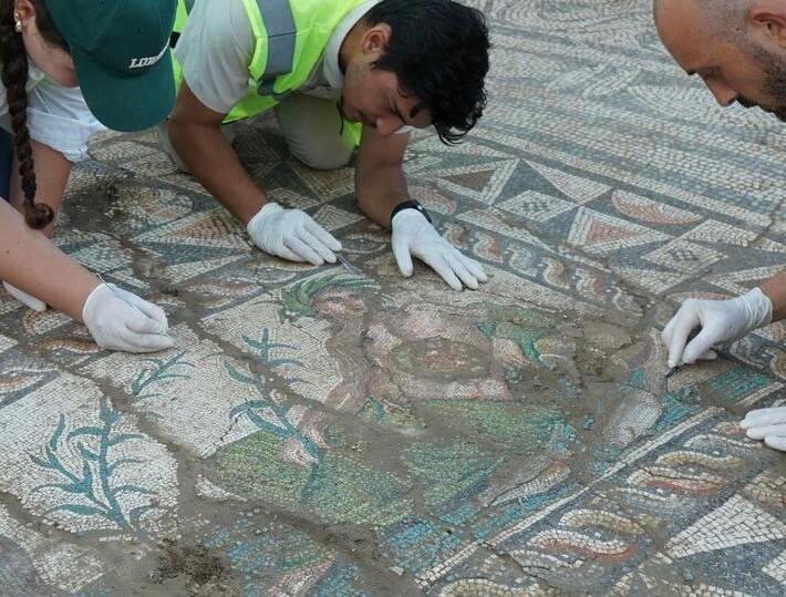 An 1,800-year-old Roman mosaic depicting a river god surrounded by fish ...