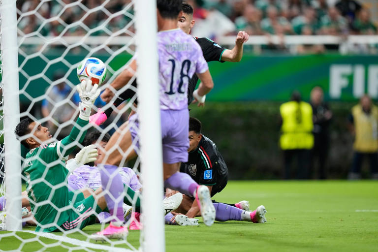Mexico becomes first country to reach knockout stage of World Cup ...