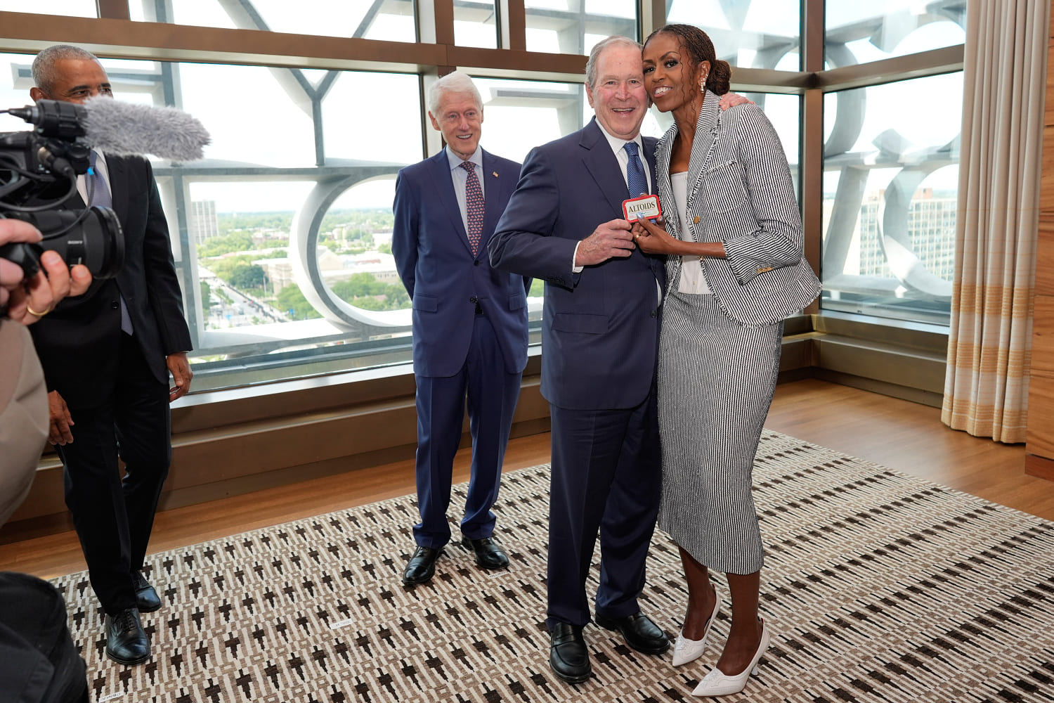 George W Bush and Michelle Obama have sweet reunion, complete with a ...