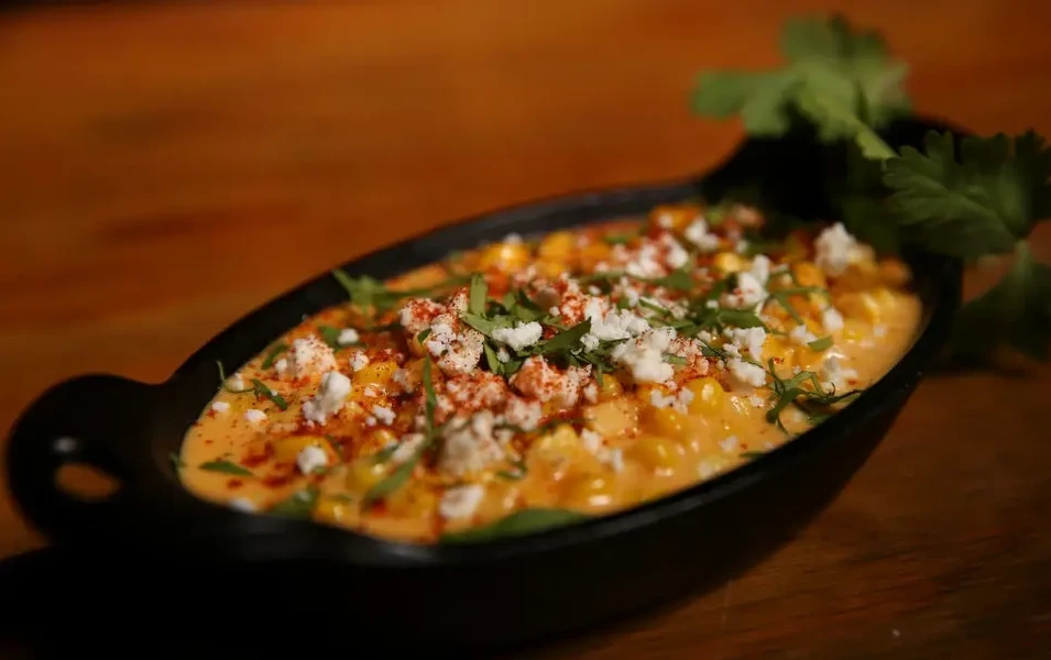 Elote pizza and fresh market finds redefine summer menus
