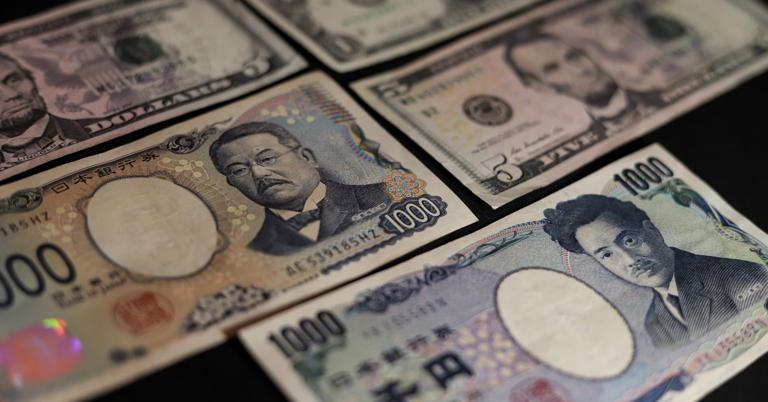 Yen slides past 161 against the dollar, nearing 40-year low and ...