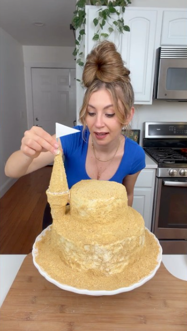 Turning a cake into a sand castle creation