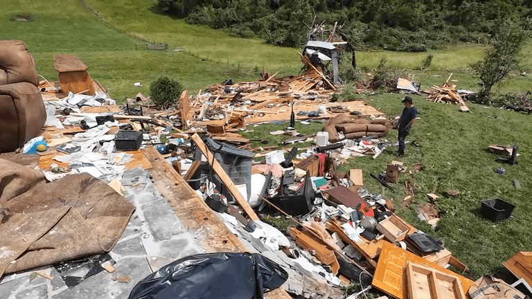 Storms down utility pole and trees, toss hay bales onto Tri-State road