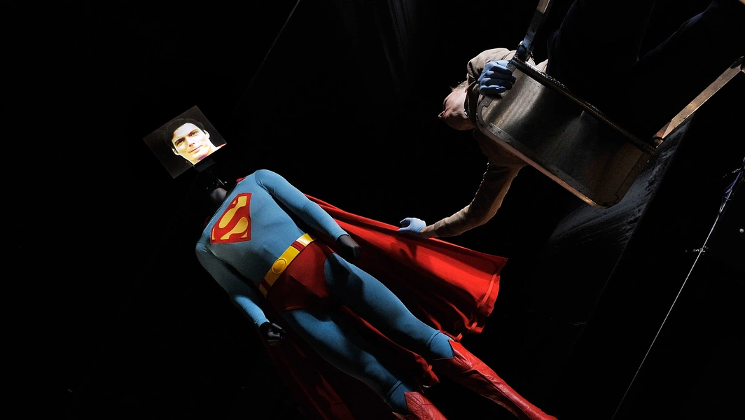 Supergirl’s cape weaves past and present