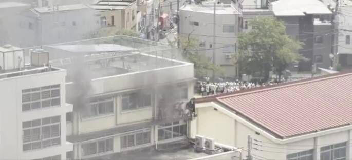 Tokyo school fire: Children cling to window ledge as blaze engulfs ...