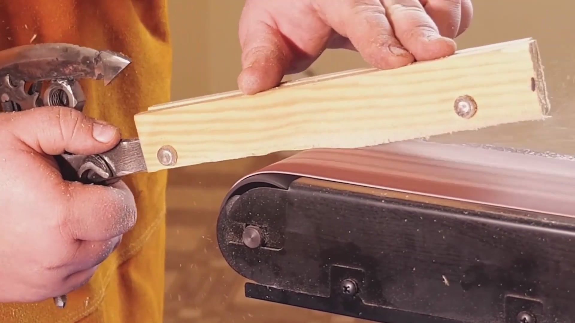 Crafting an axe from recycled metal waste