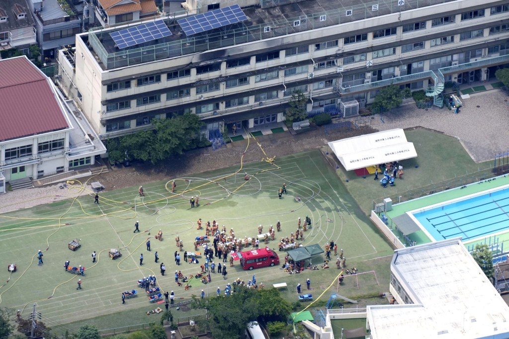 Teachers and children escape through window after Tokyo school fire