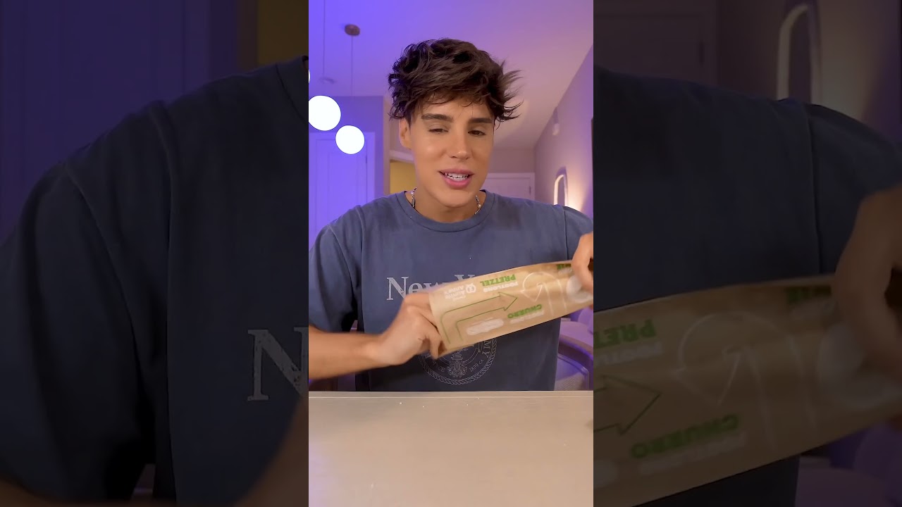 Hungry reviewer tackles massive foot-long sweet treats on camera