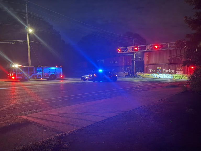 Train, car collide in Raleigh; driver facing charges