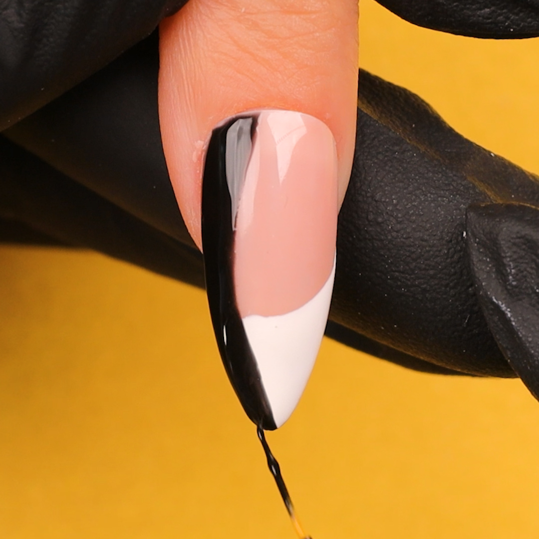 Elevate your look with black and white nails 🖤🤍