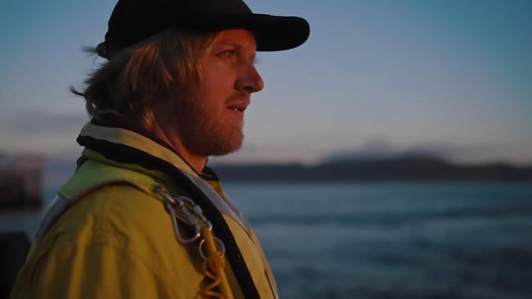 Salmon Tasmania ad banned over footage below fish pen that could ...