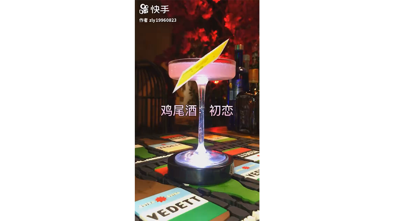 Crafting romantic pink first love cocktail with elegant garnish ...