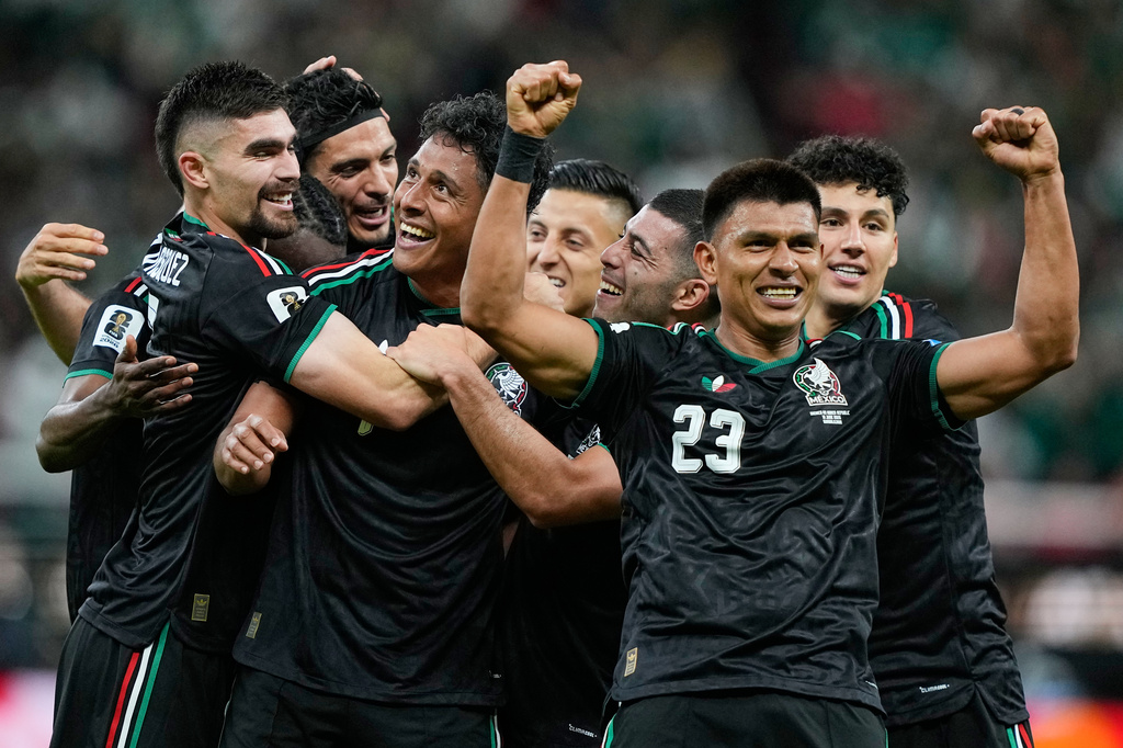 Mexico becomes first country to reach knockout stage of World Cup ...