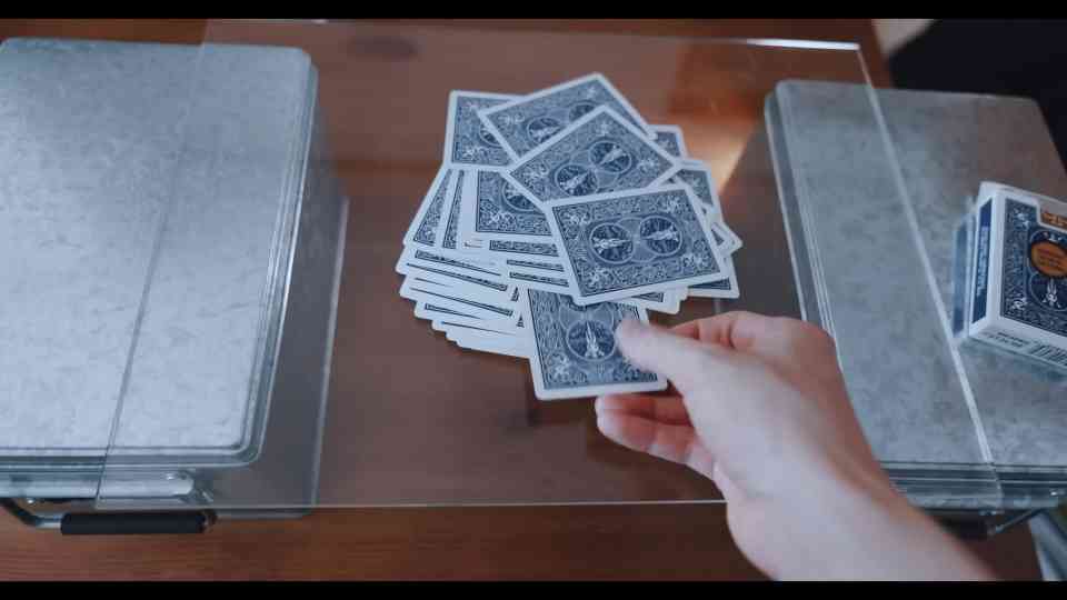 A playing card met a window and chose violence