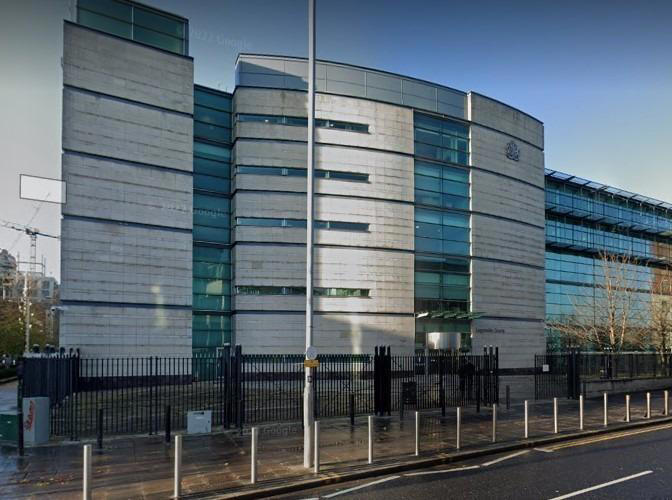 Man accused of assaulting brother on Belfast street while carrying an axe