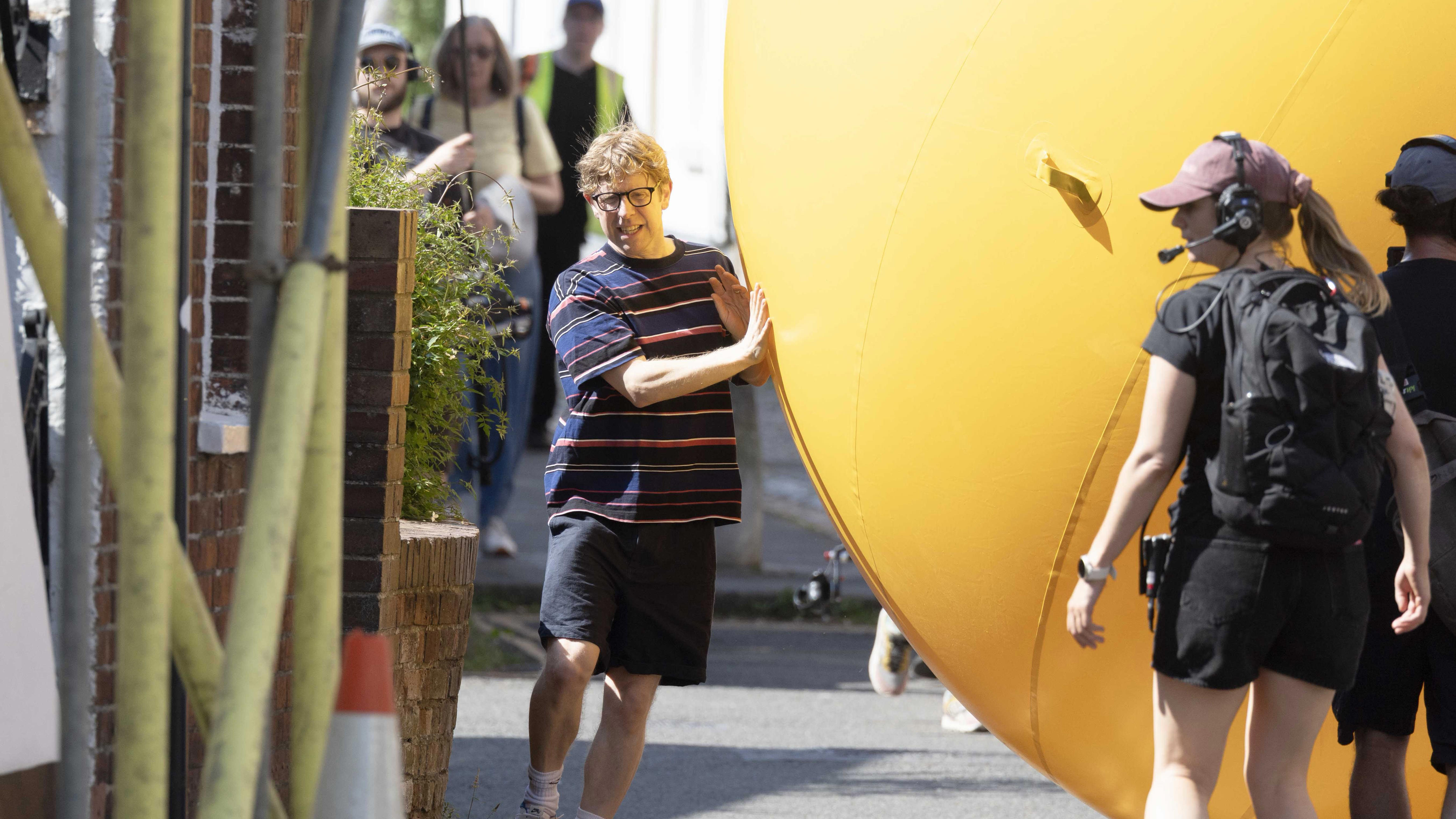 Josh Widdicombe wrangles giant yellow ball on to boat for new TV show