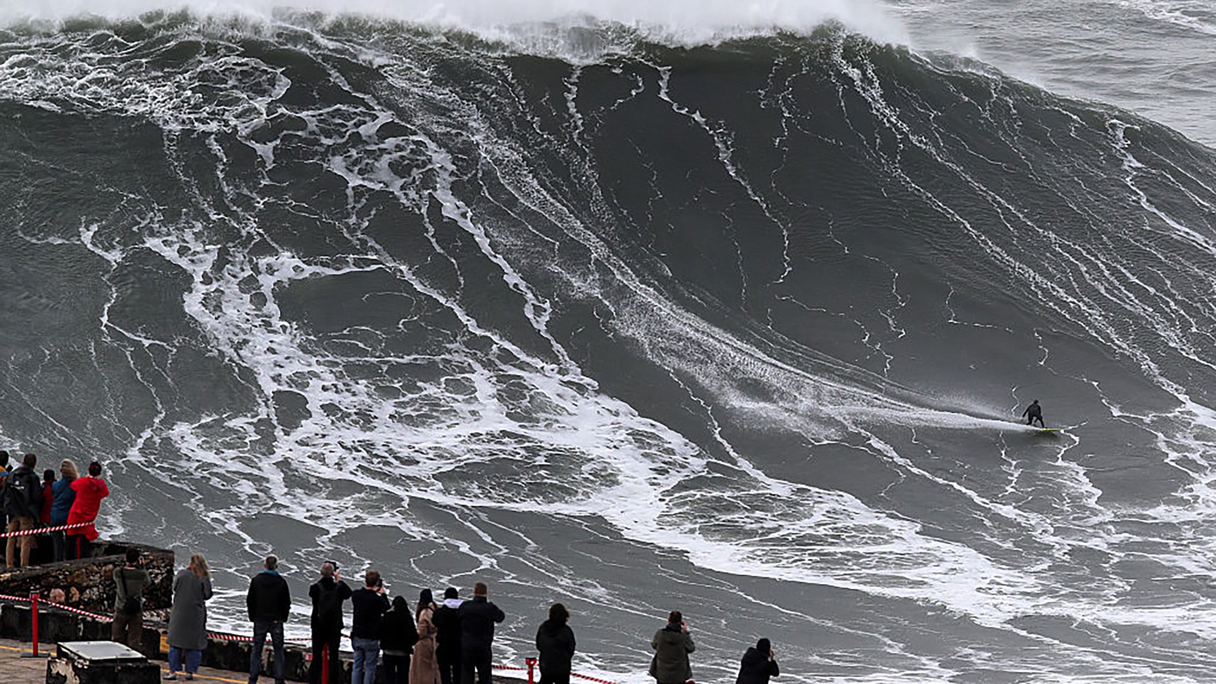 I paddled a surfboard into a 70-foot wave. Here’s what it was like.