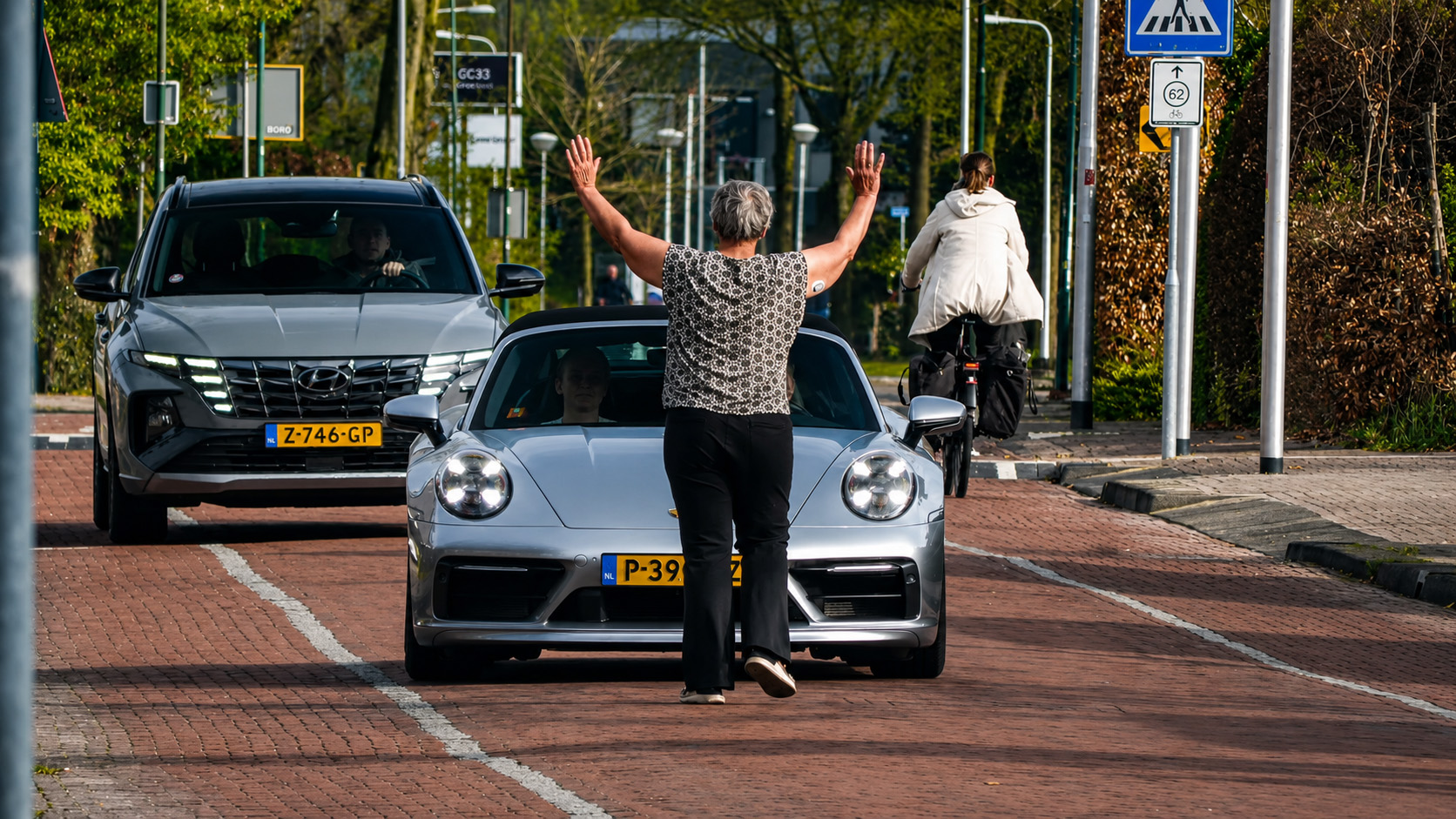 Why did locals stop this Porsche driver on the way to a car meet?