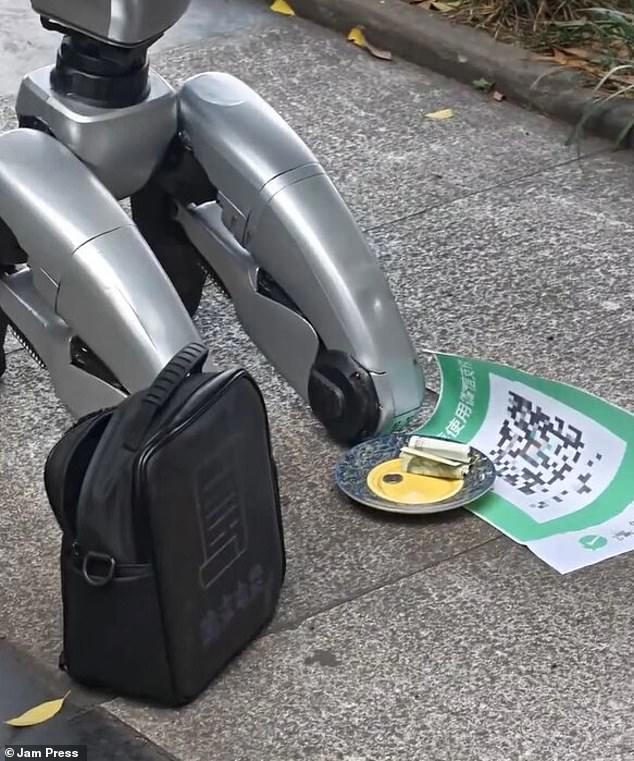 Humanoid robot is spotted begging on a street in China - claiming it ...