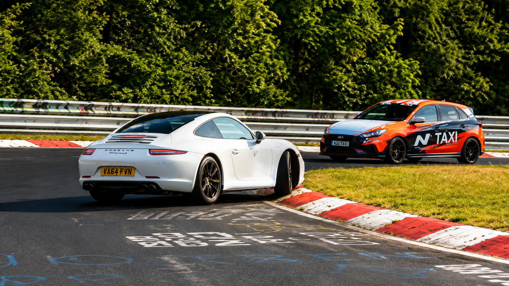 Porsche spins out mid-corner and creates a dangerous close call