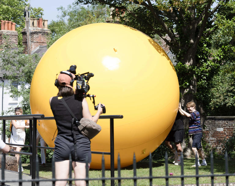 Josh Widdicombe wrangles giant yellow ball on to boat for new TV show