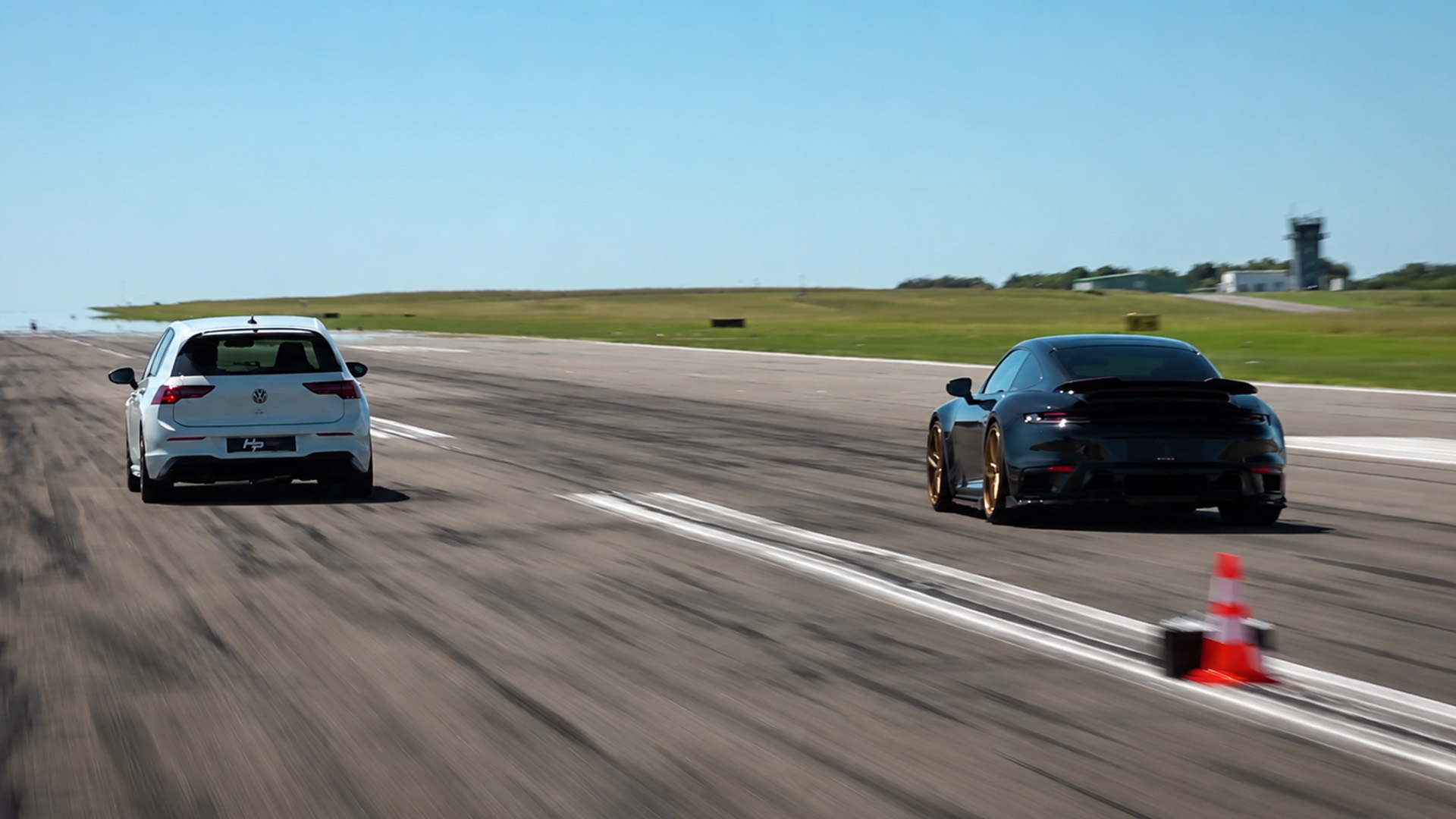 Can this VW Golf catch Porsche power in drag battle?