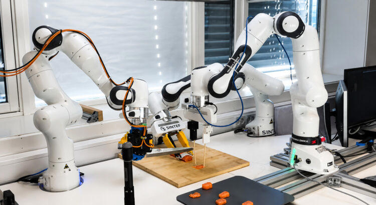 This three-armed robot can slice-and-dice salmon into sashimi