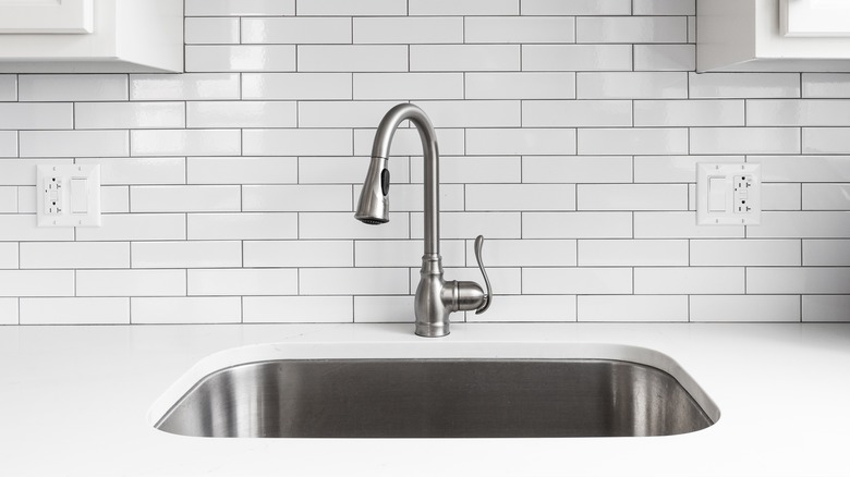 14 clever hacks to clean your kitchen sink