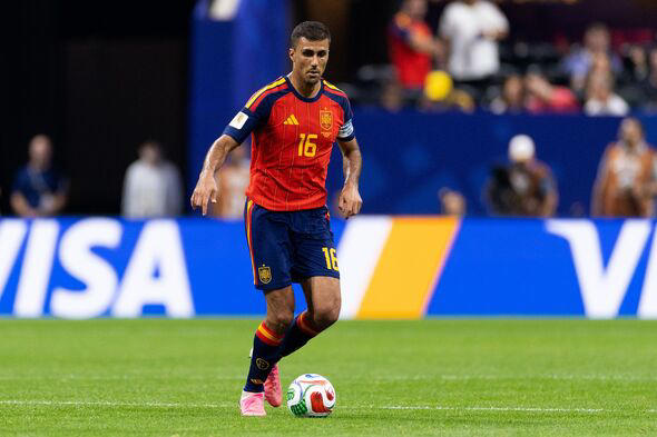 Spain boss slams 'insulting' criticism of Rodri after World Cup draw ...