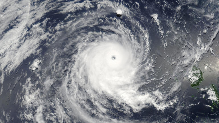 Typhoon Jangmi is churning the Pacific a few hundred miles west of Guam