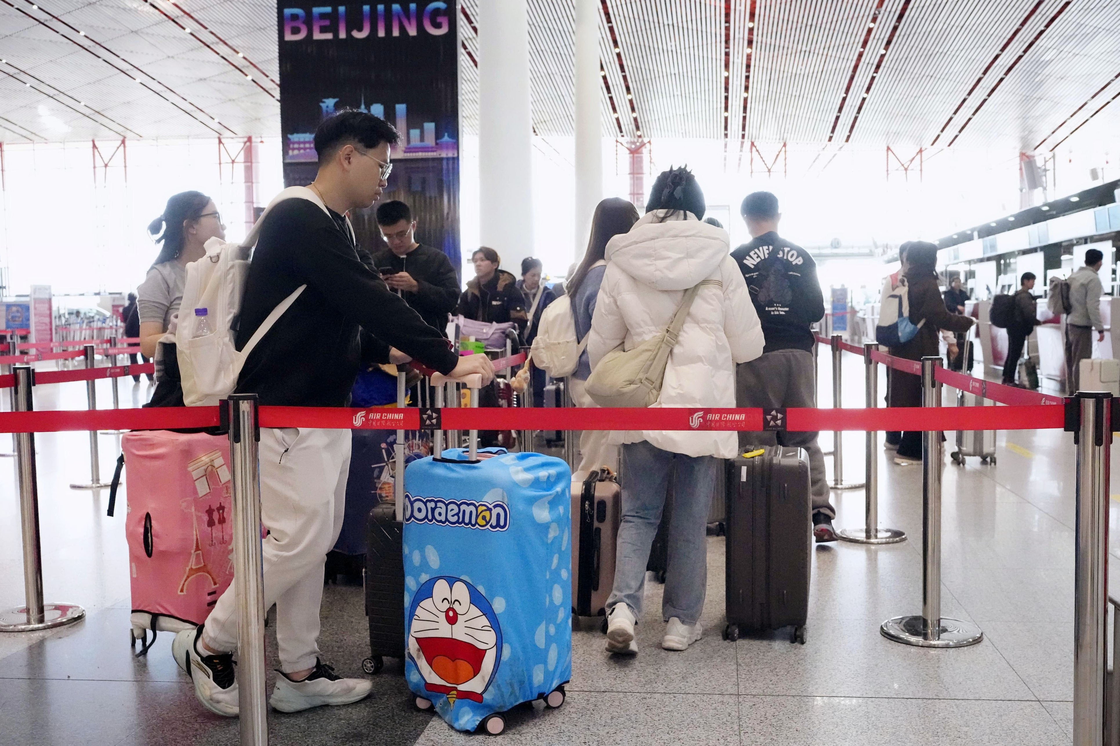 China travel agencies resume Japan group tours, some later halt sales
