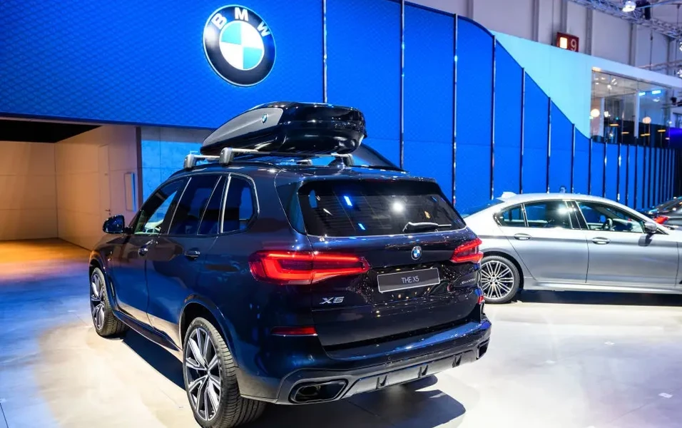 Luxury SUVs shed family image to become male status symbols