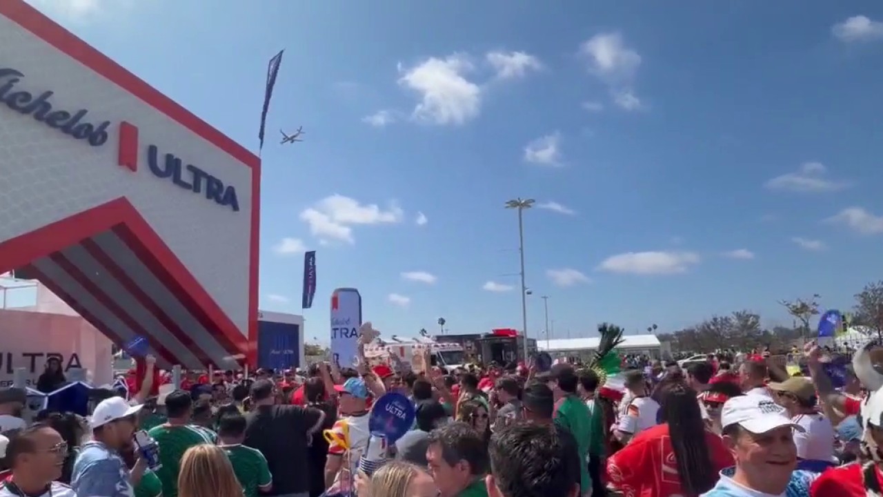 Visitors enjoy fan experience zone at LA stadium