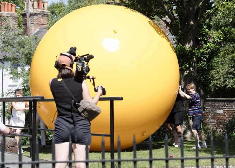 Josh Widdicombe wrangles giant yellow ball on to boat for new TV show