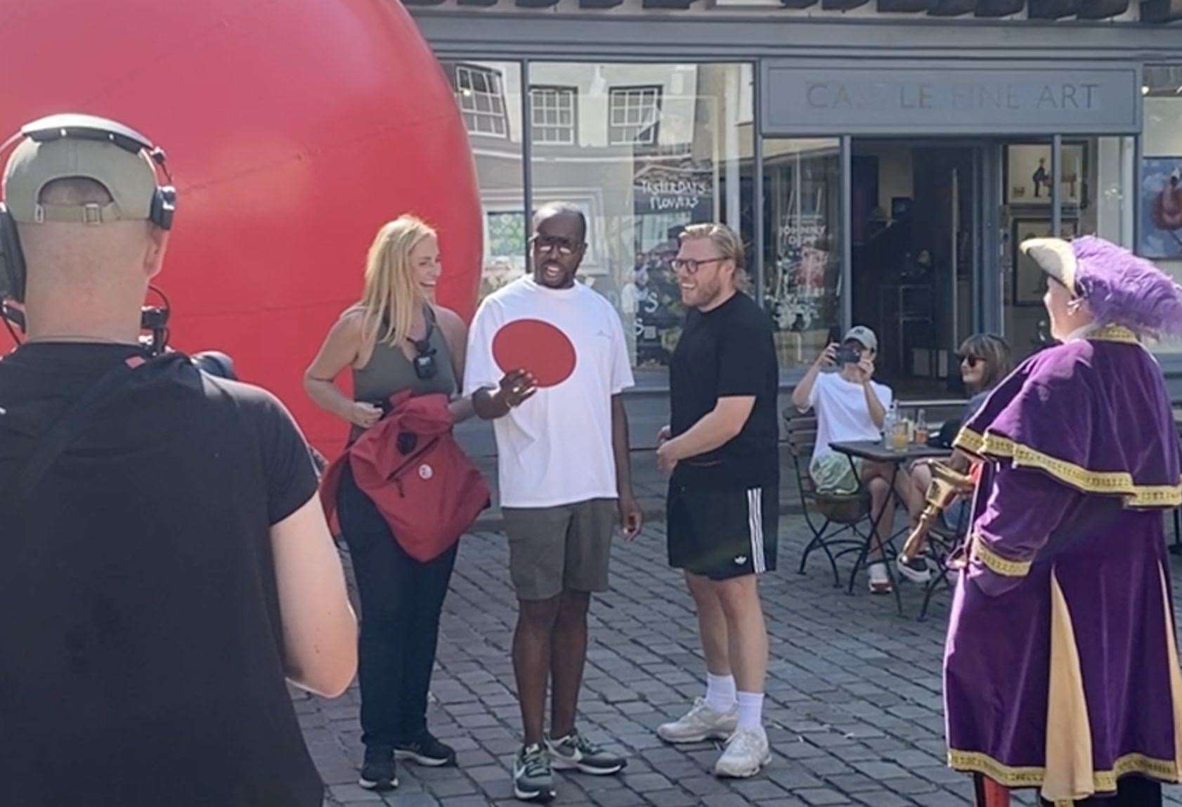 Rob Beckett, Josie Gibson and Kiell Smith-Bynoe push giant red ball ...