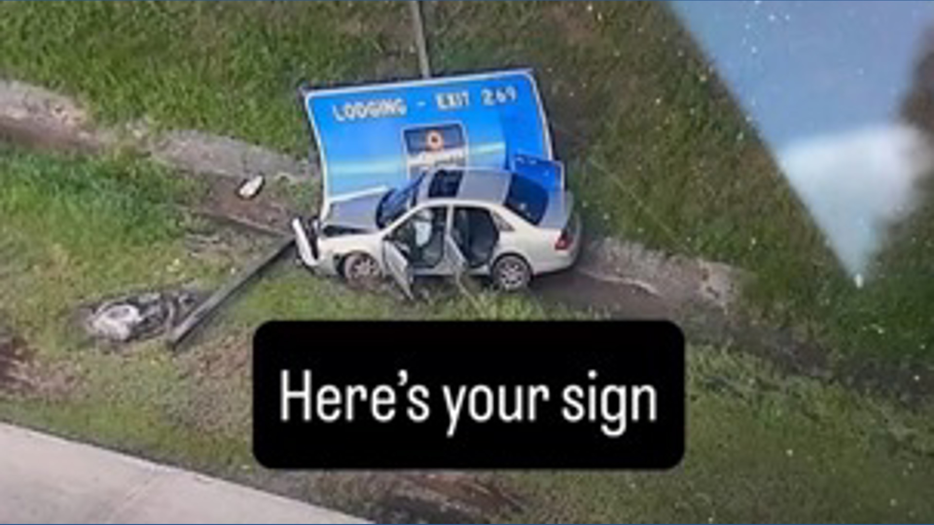 A car hits a road sign on I-75