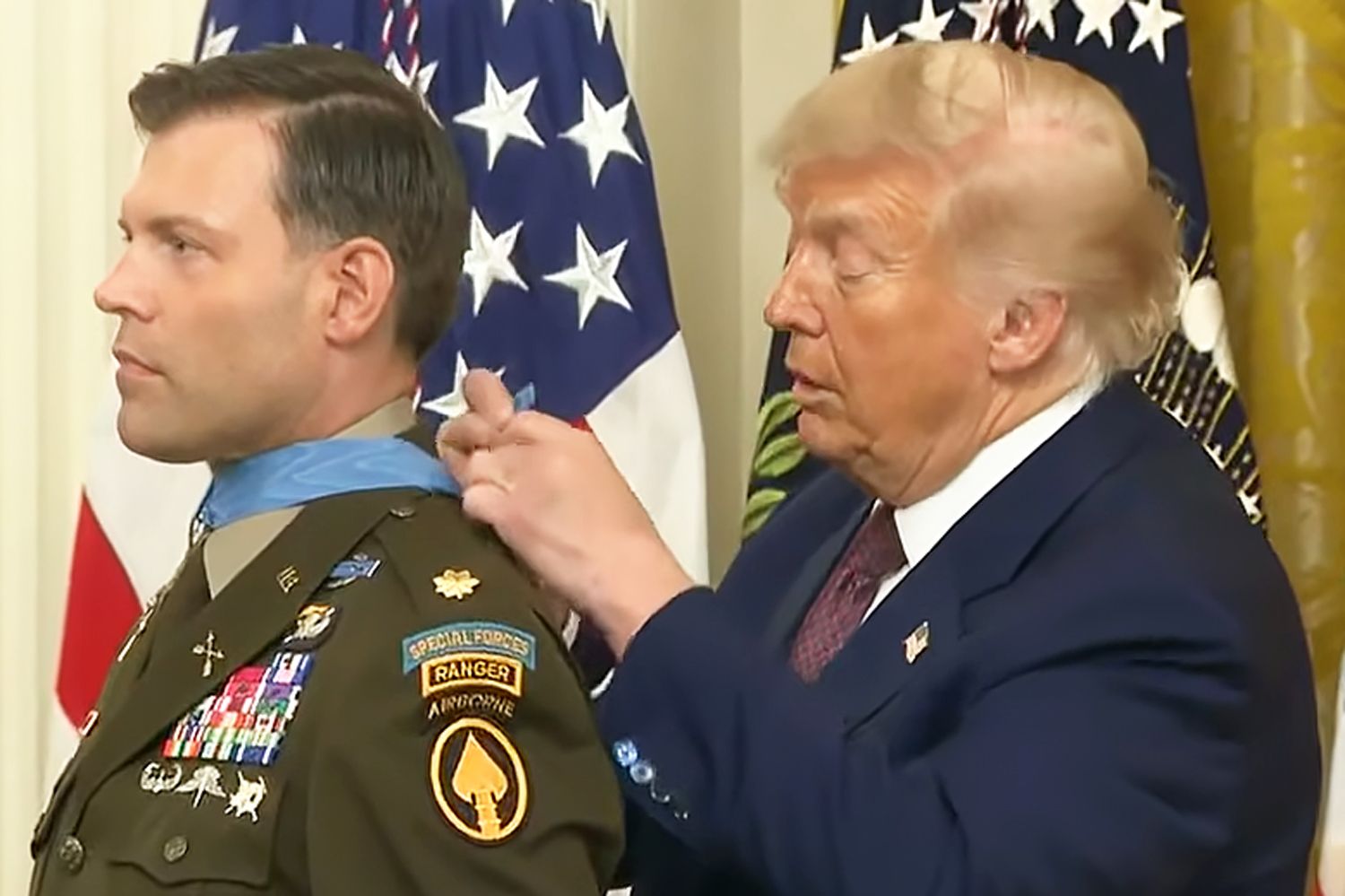 Donald Trump ties Congressional Medal of Honor around recipient's neck ...