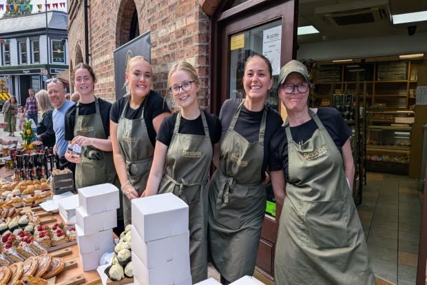 Huge crowds take to village as street is transformed into giant street café