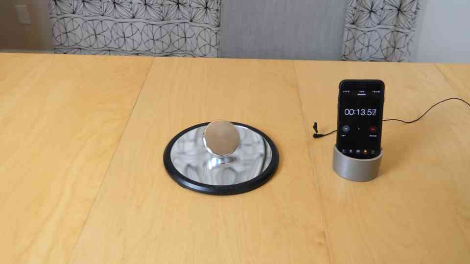 Gravity-defying coin takes 2 minutes to tip over