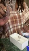 Woman unboxes fake iPhone