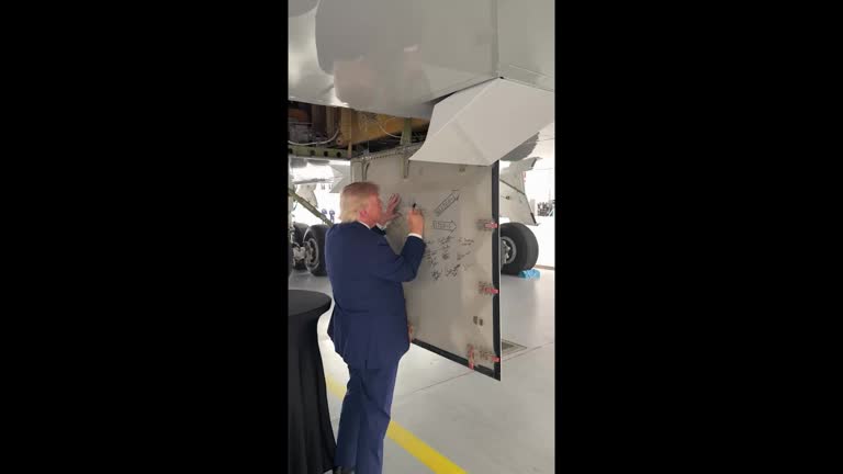 Trump signs mechanical panel of Air Force One plane gifted by Qatar