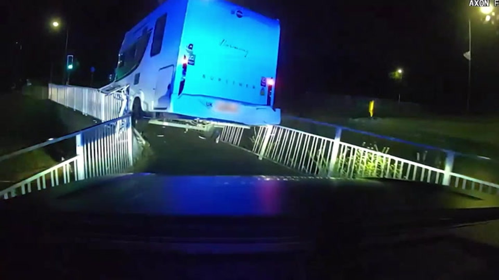 Moment motorhome thief crashes into footbridge and somersaults off