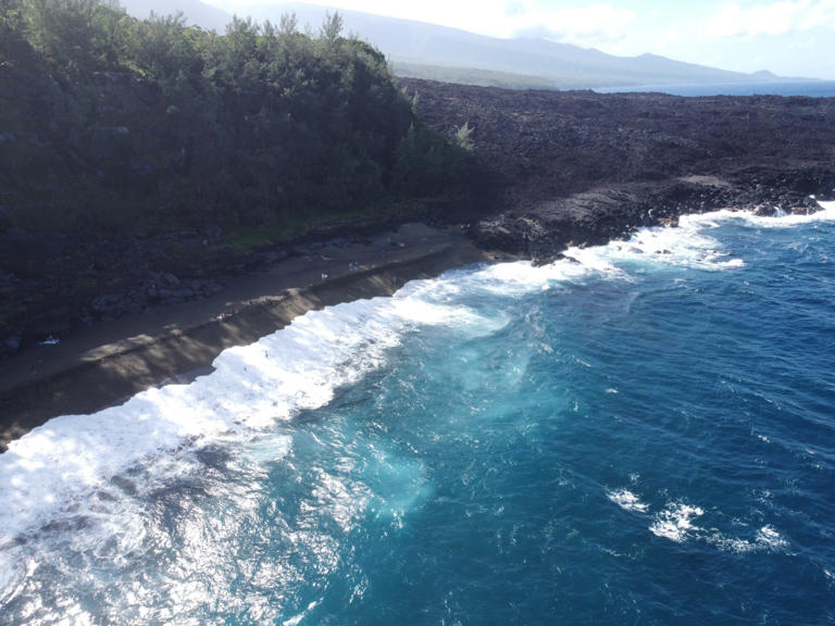 On Réunion Island, this wild black-sand beach shaped by lava flows ...