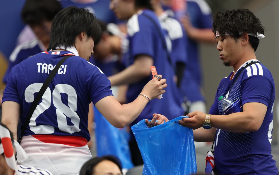 Japan's stadium clean-up tradition sparks gender role debate