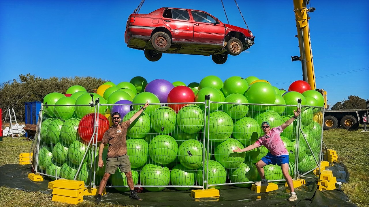They dropped a car on 1,000 exercise balls - what happened was wild
