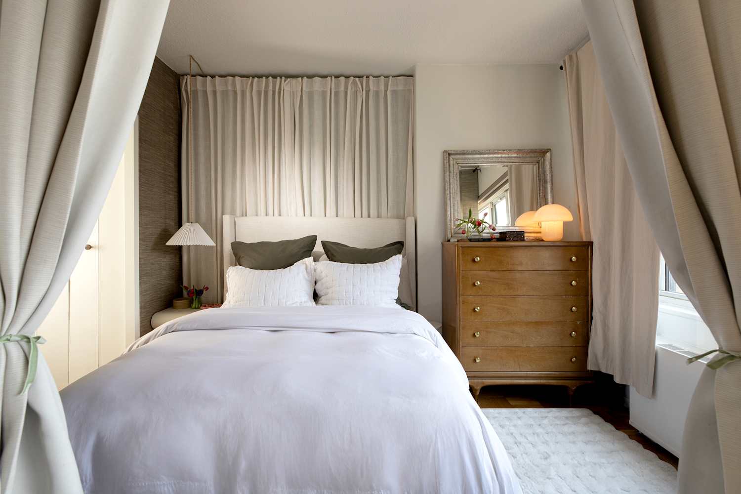 A tiny studio turned into a proper one-bedroom, thanks to an IKEA bookcase