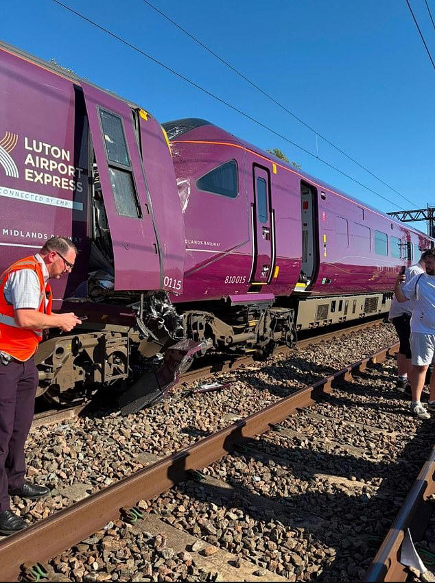 Driver feared dead as Luton Airport Express collides with stationary ...
