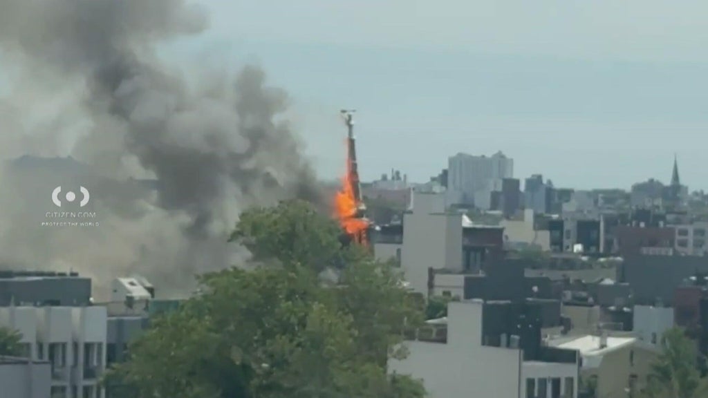 Dramatic video shows steeple collapse as fire tears through Brooklyn church