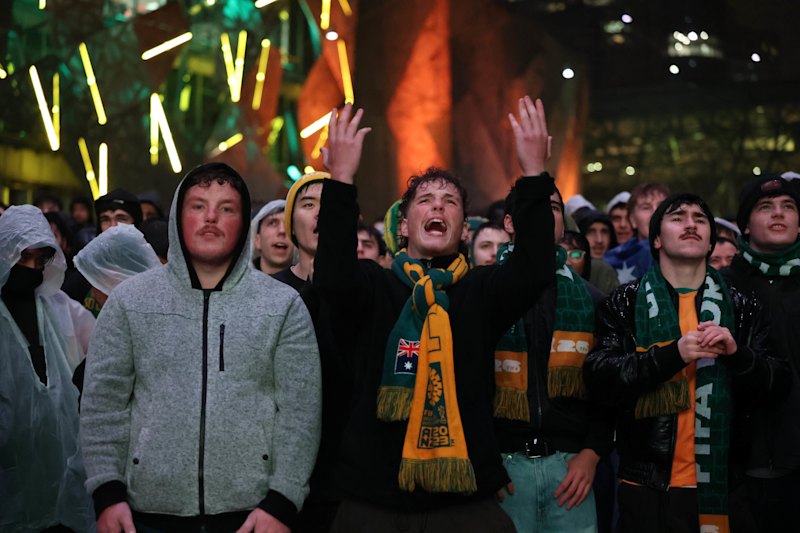 Sodden fans lament 'horrible' ref decisions as flares go off at Fed Square