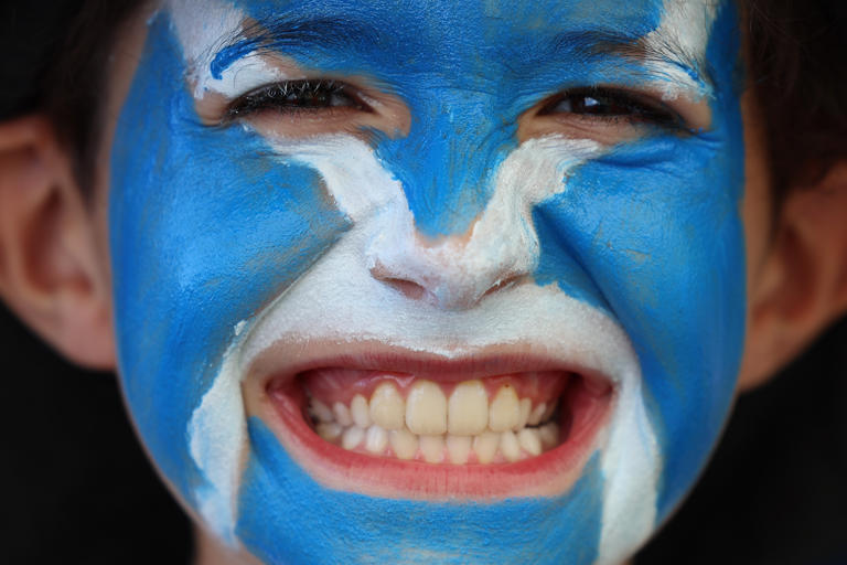 World Cup fans flood stadiums and fan zones with dazzling costumes ...